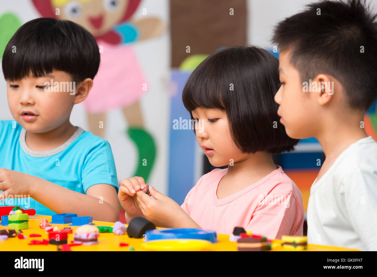 Children playing in kindergarten Stock Photo - Alamy