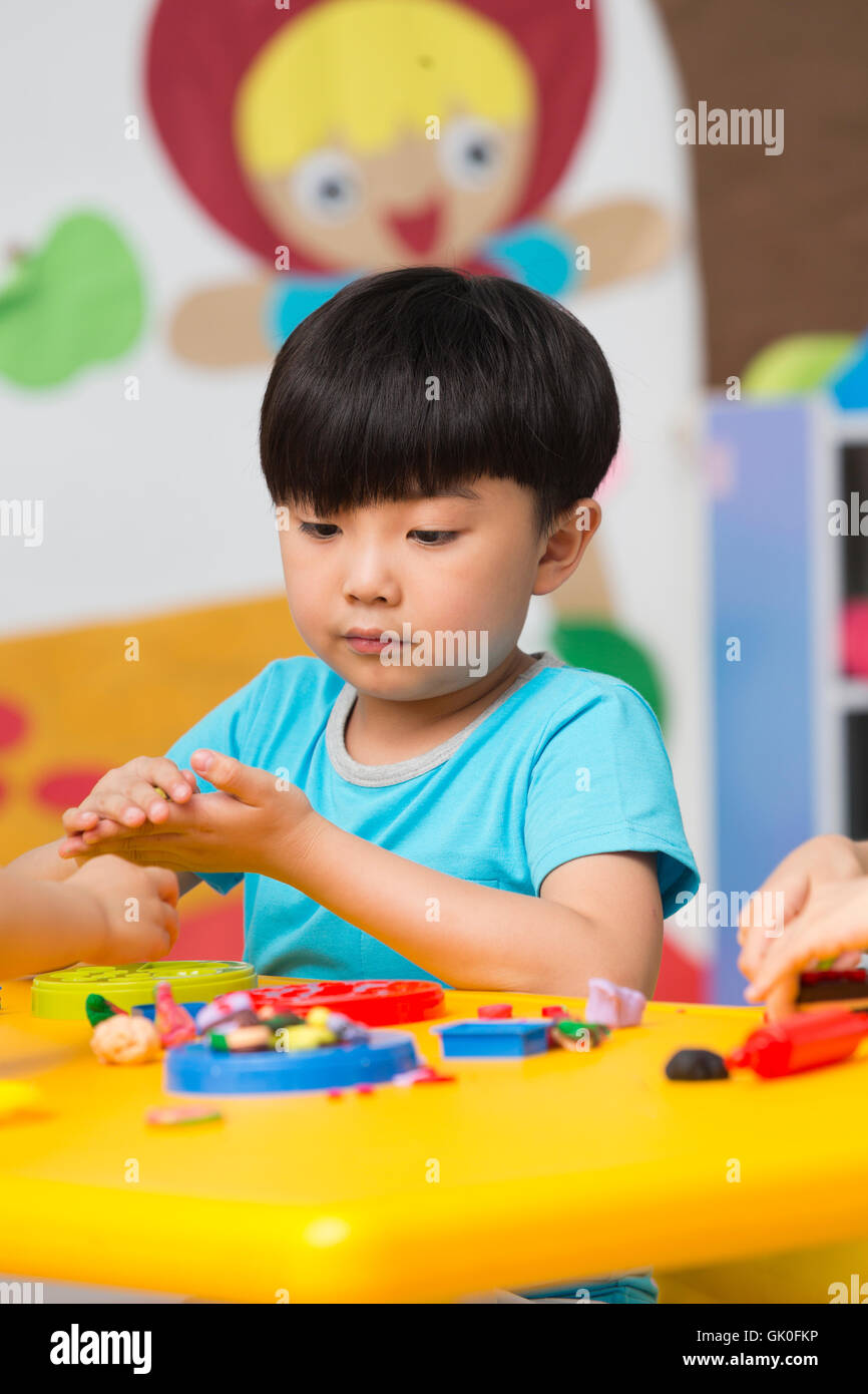 Children playing in kindergarten Stock Photo - Alamy
