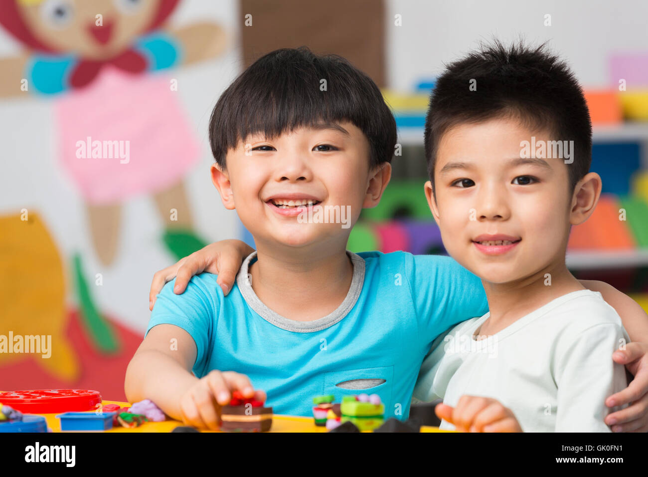Children playing in kindergarten Stock Photo - Alamy