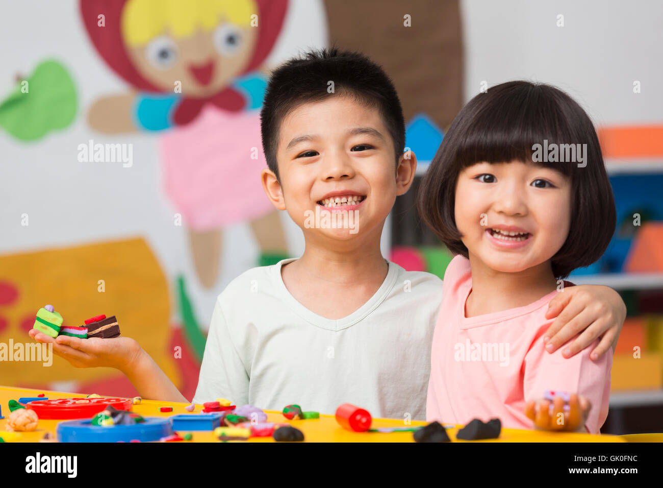 Children playing in kindergarten Stock Photo - Alamy