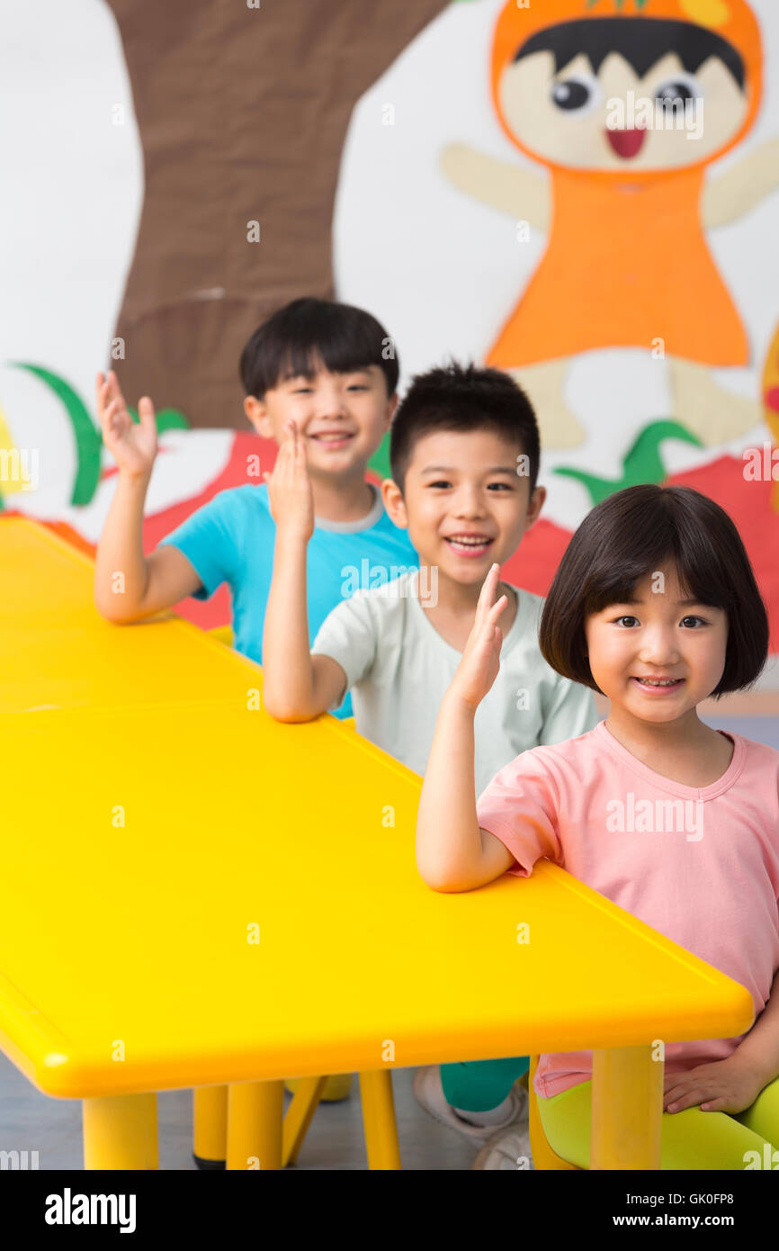 Children playing in kindergarten Stock Photo - Alamy