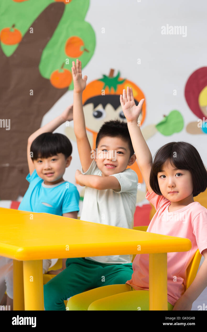 Children playing in kindergarten Stock Photo - Alamy