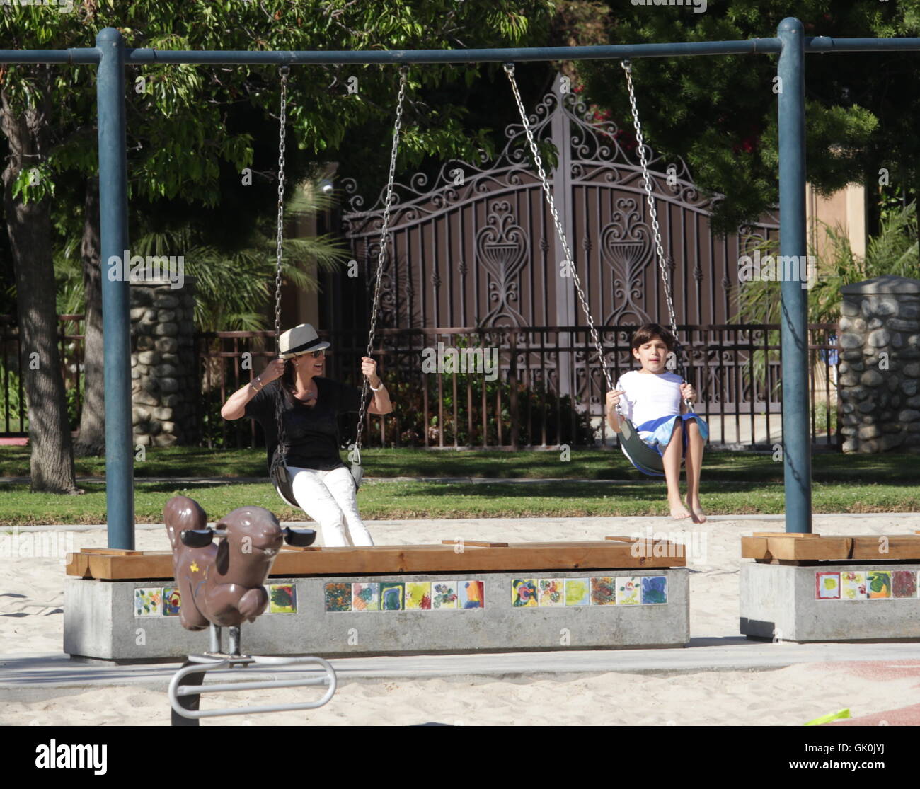 Lauren Silverman enjoys a day in the park with her two sons Adam and ...