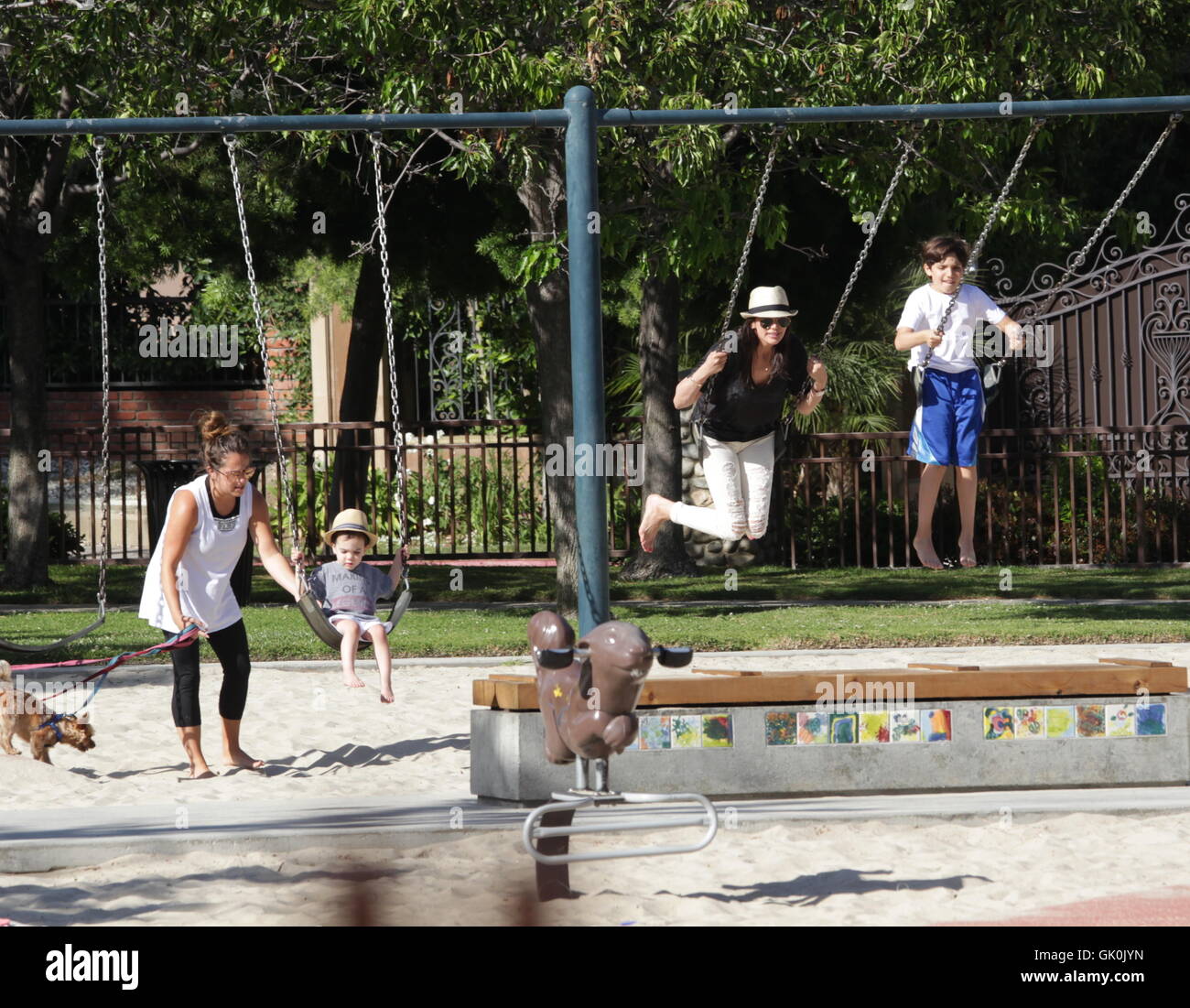 Lauren Silverman enjoys a day in the park with her two sons Adam and ...