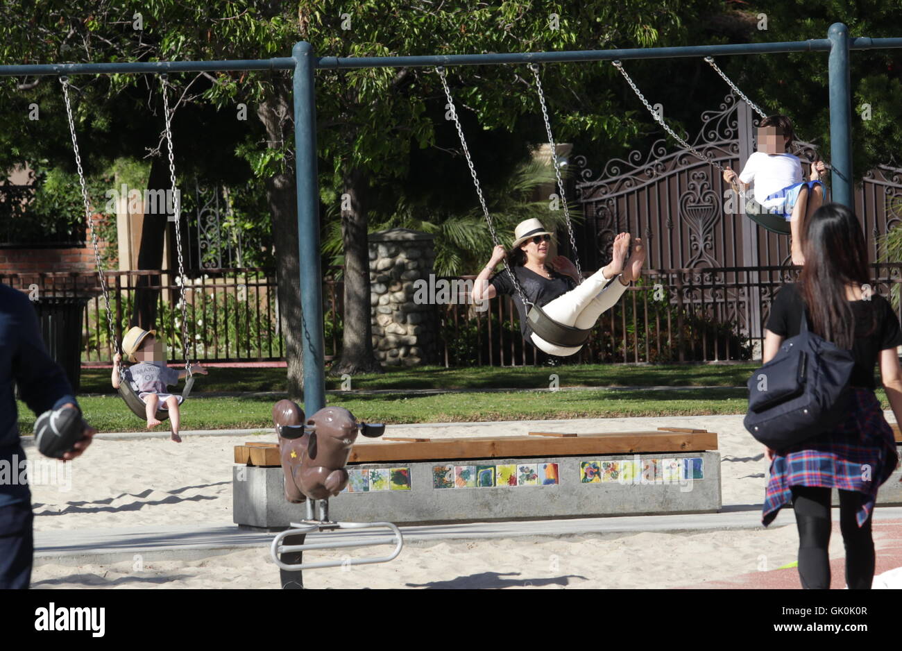 Lauren Silverman enjoys a day in the park with her two sons Adam and ...