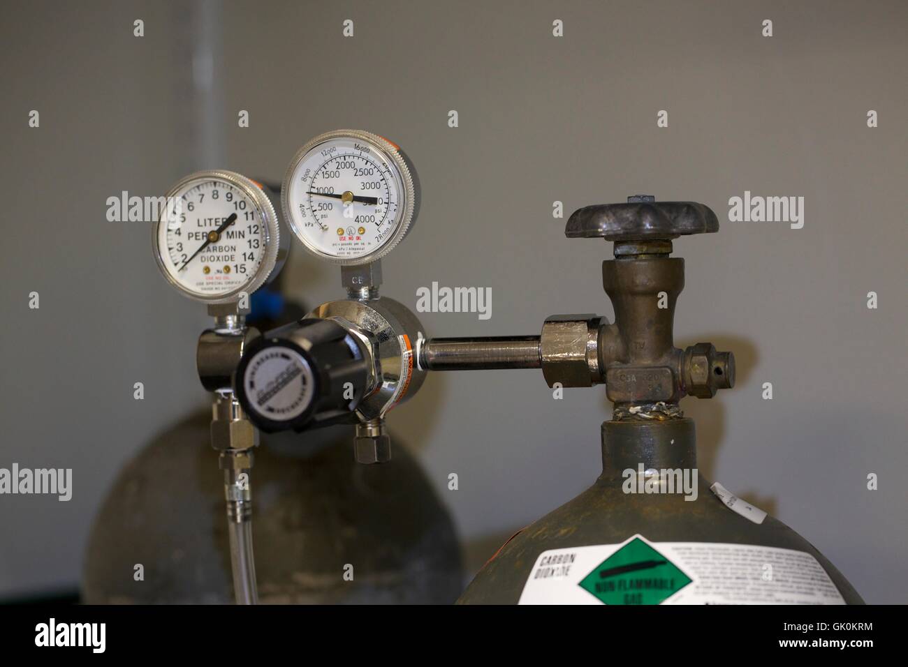 Pressure gauge and valve on carbon dioxide tank Stock Photo - Alamy