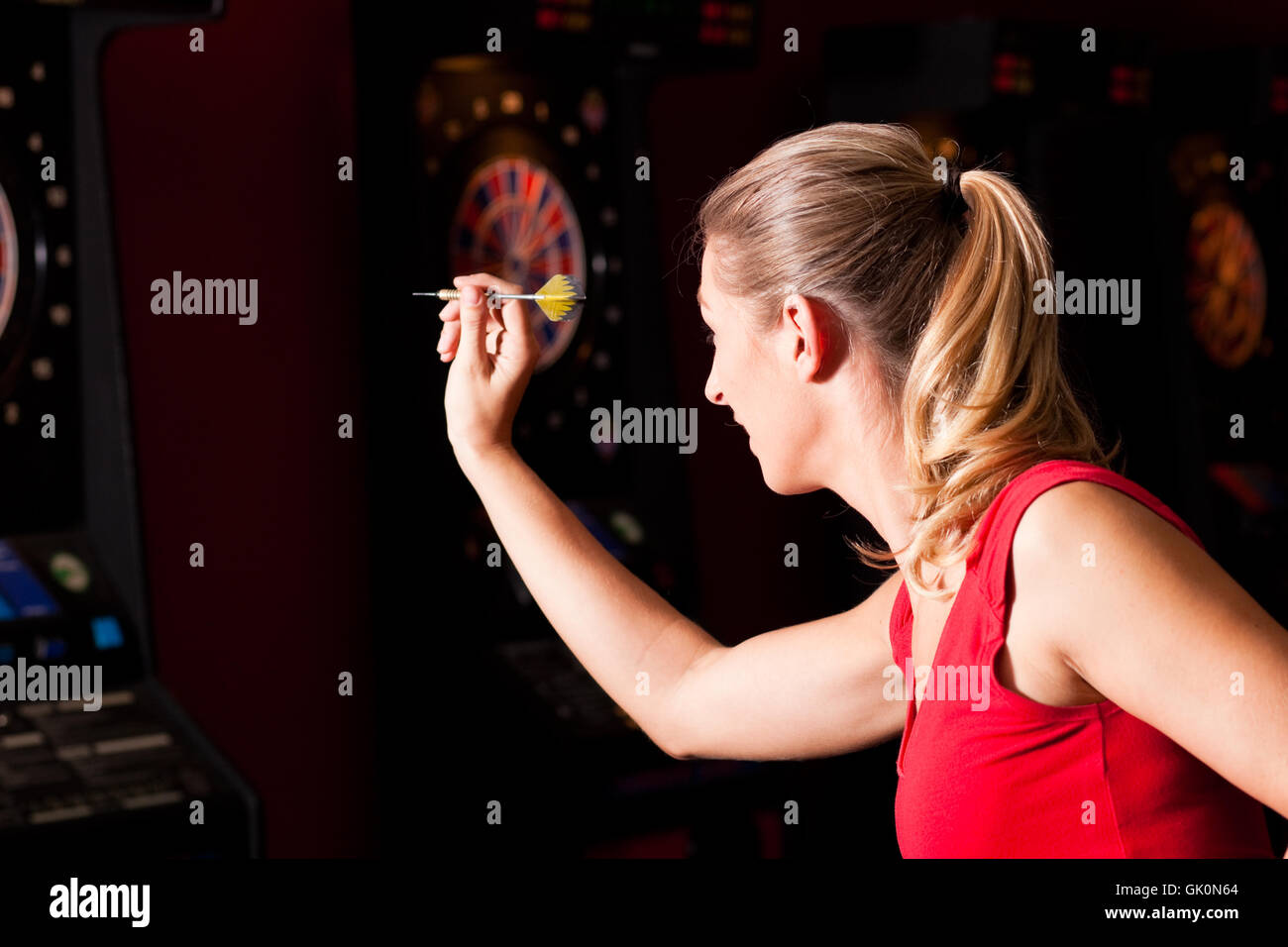 woman playing darts Stock Photo - Alamy