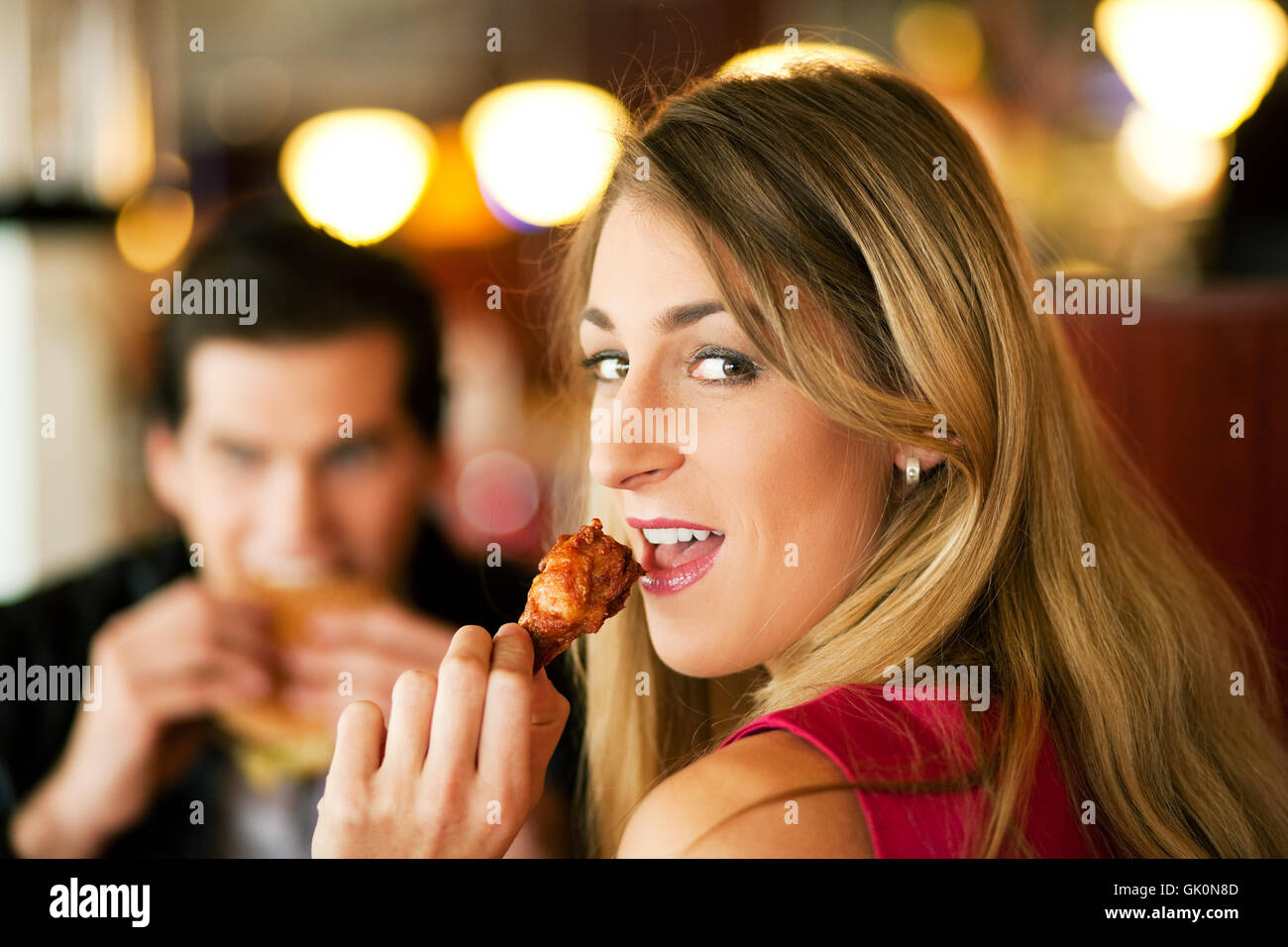 Couple eat chicken restaurant hi-res stock photography and images - Alamy