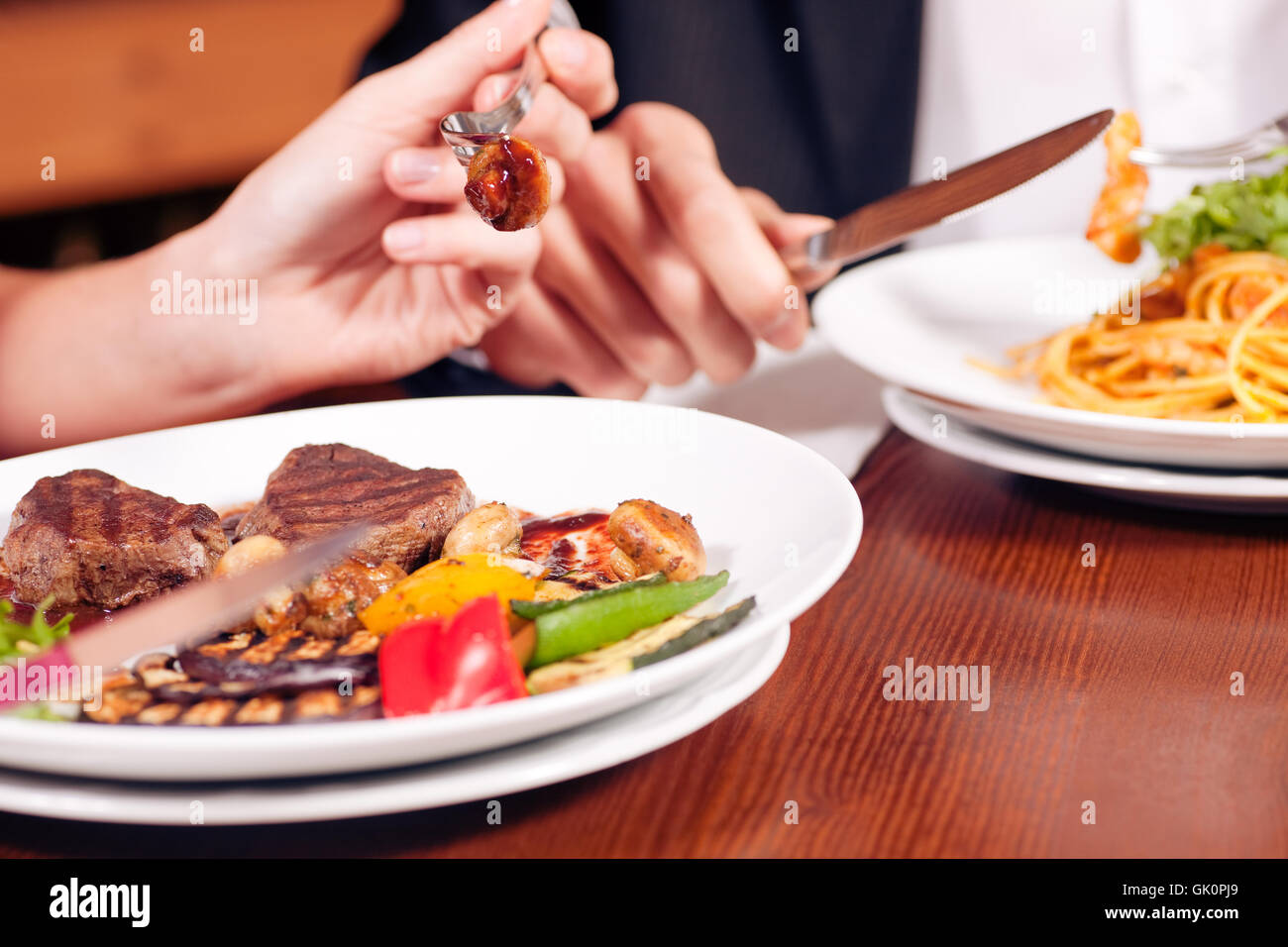 restaurant hand steak Stock Photo - Alamy