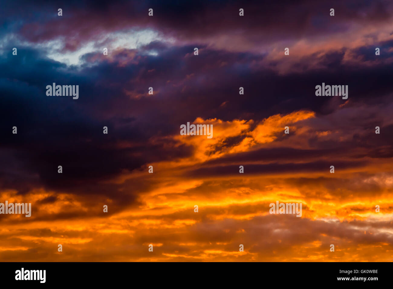 Beautiful sunset with dark clouds Stock Photo - Alamy
