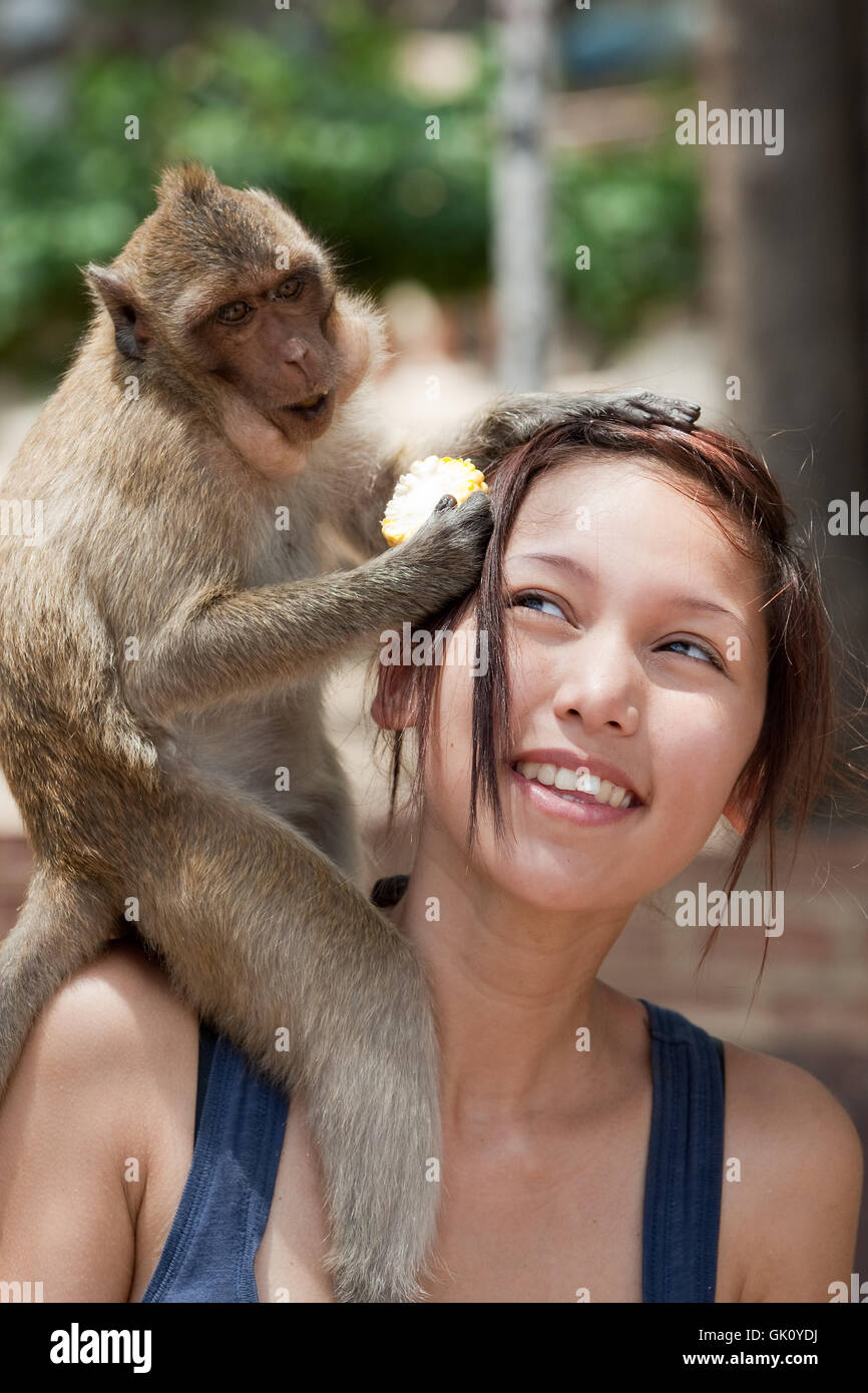 teenager with monkey Stock Photo - Alamy