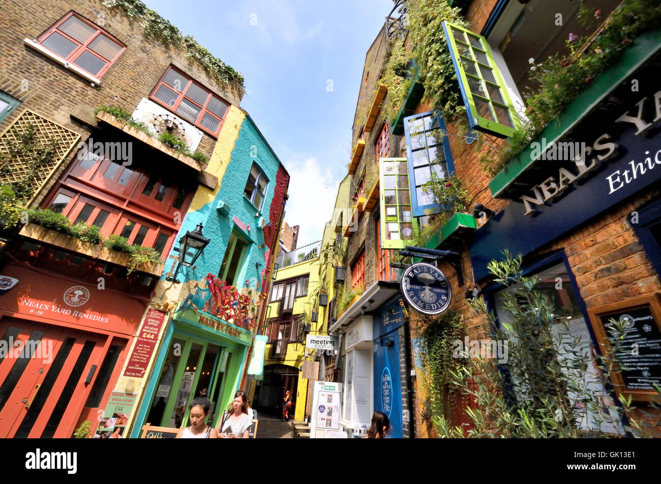 London England, UK. Neal's Yard, Covent Garden - small alleyway and ...