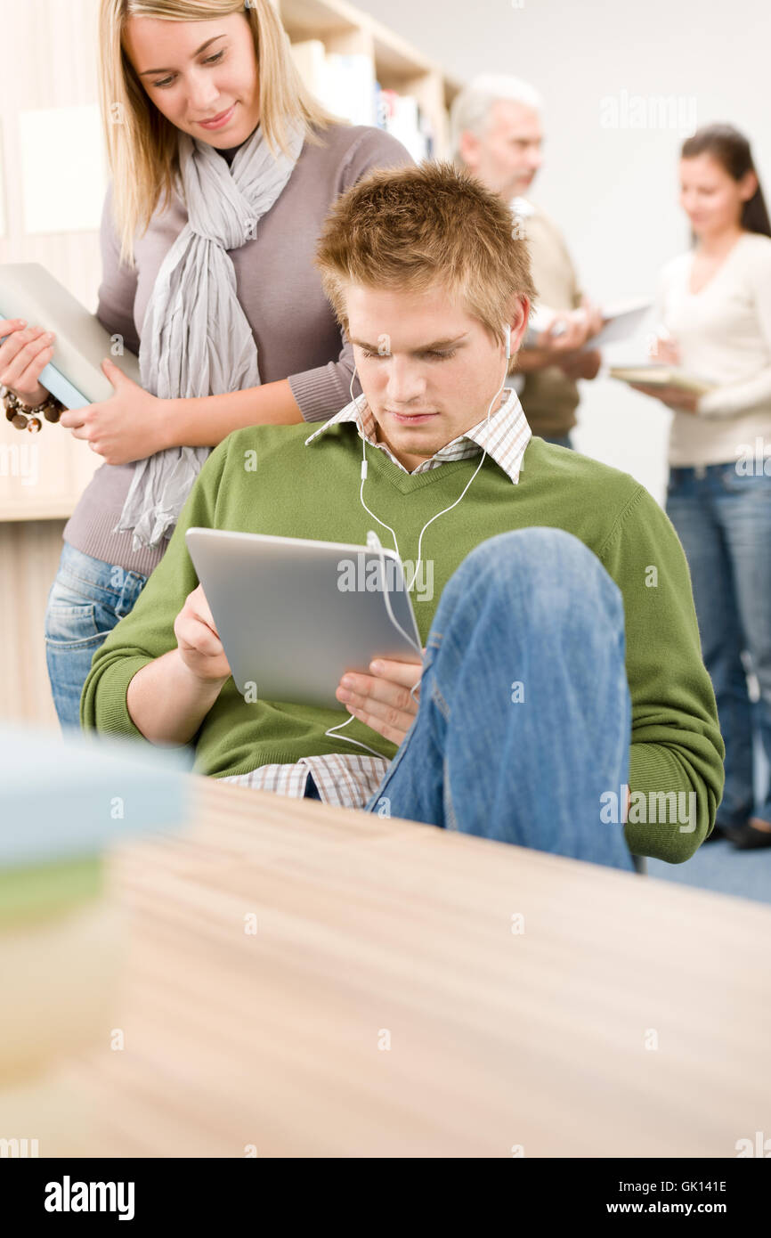 woman library tablet Stock Photo - Alamy