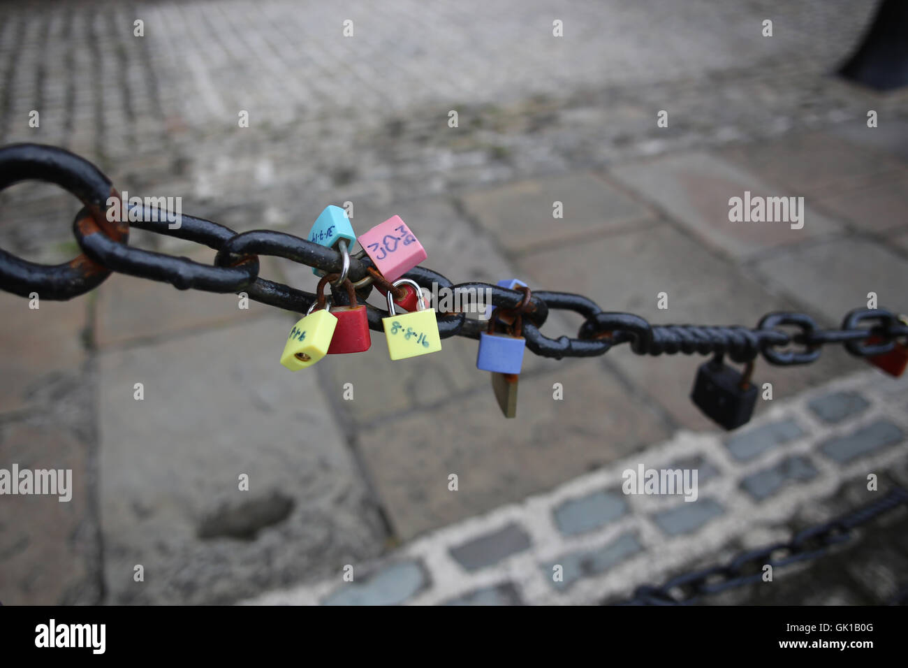 Love locks left on a chain at Albert Docks, Liverpool Stock Photo - Alamy