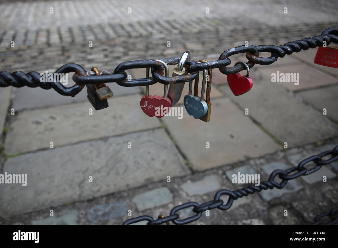 Love locks left on a chain at Albert Docks, Liverpool Stock Photo - Alamy