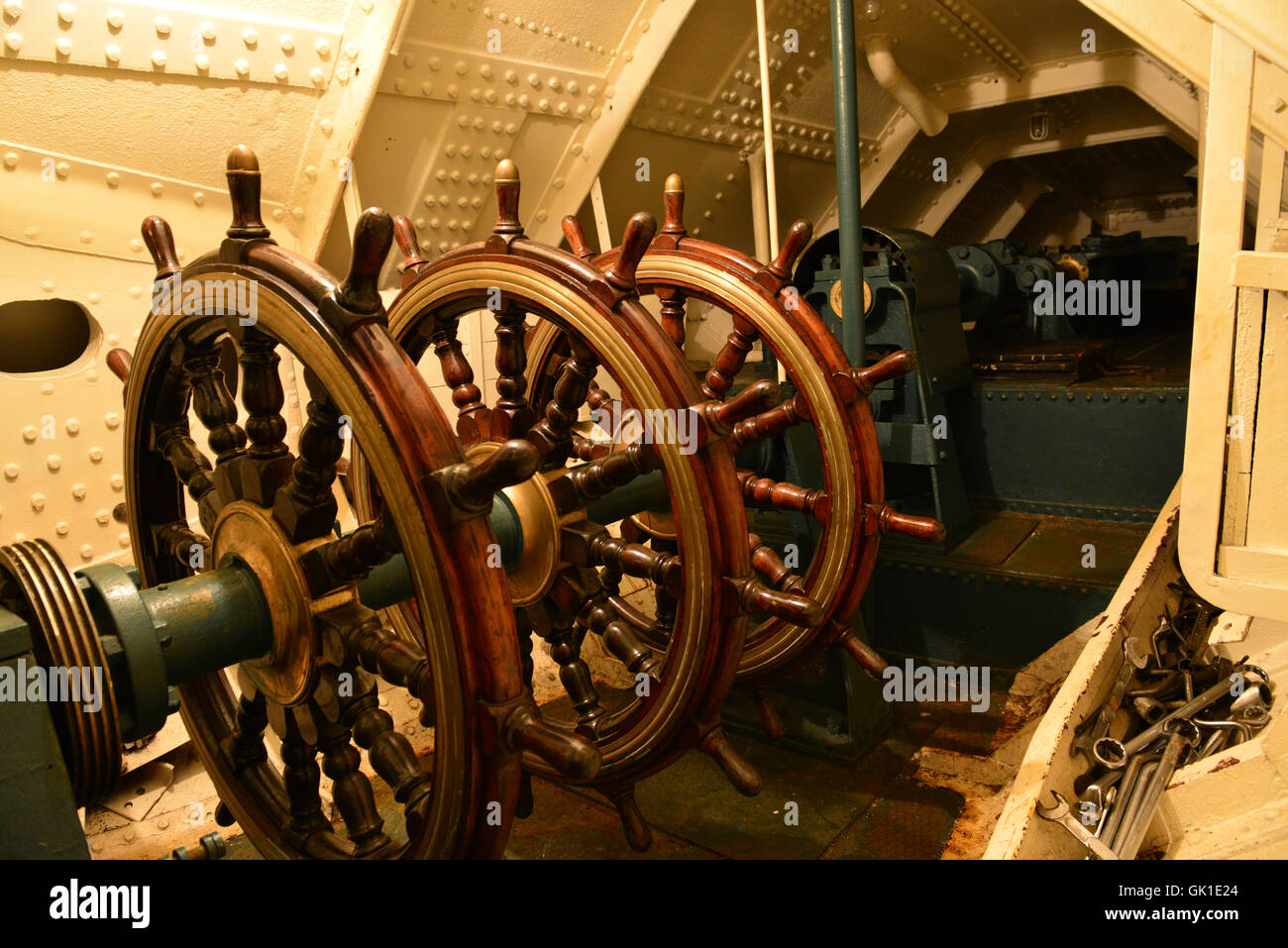 Triple wooden wheel below the decks of the HMS Caroline, Belfast Stock ...