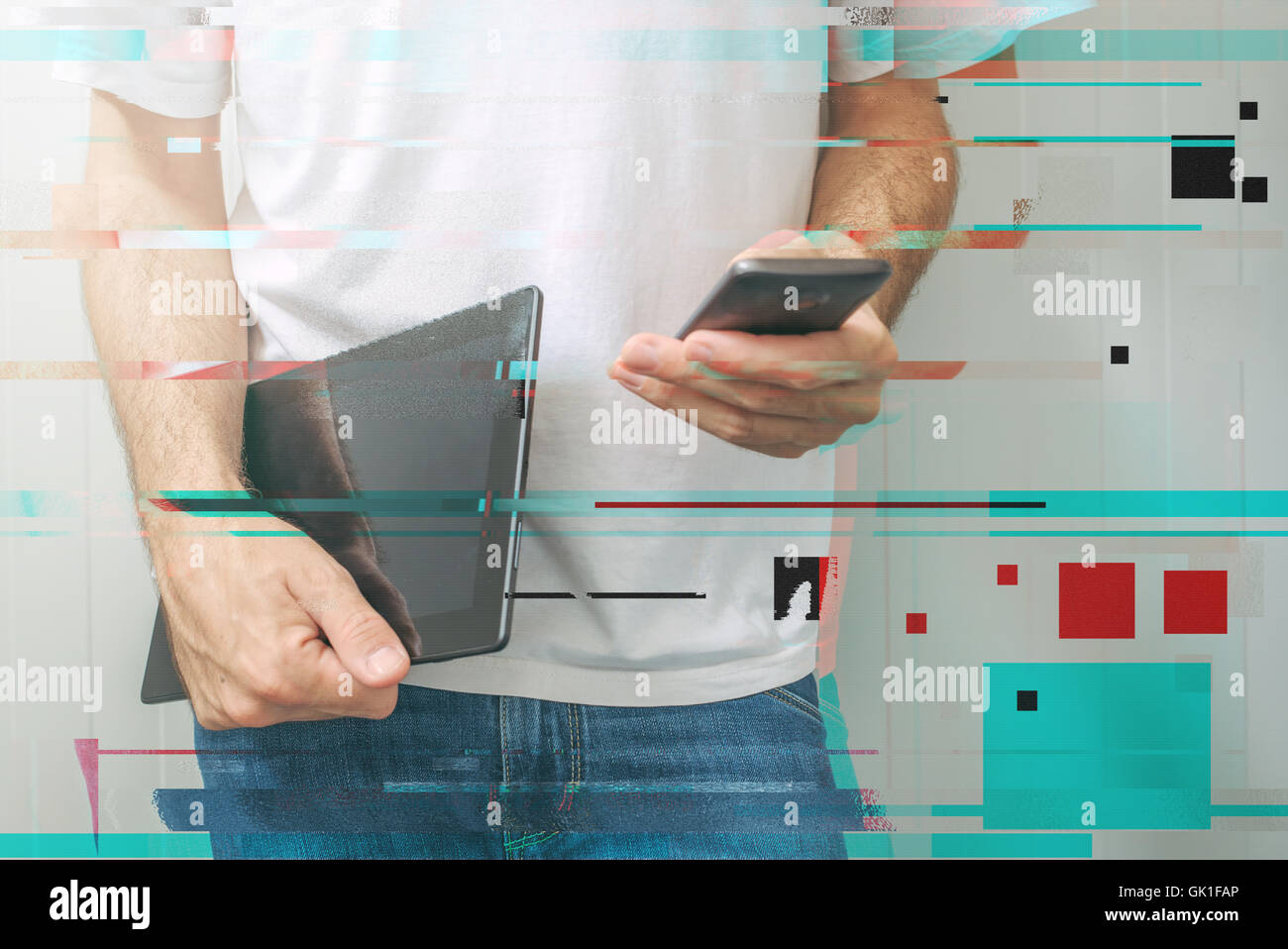 Guy using smartphone and digital tablet computer, modern mobile ...