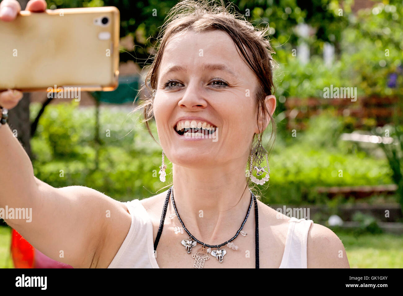 Young woman having fun cell hi-res stock photography and images - Alamy