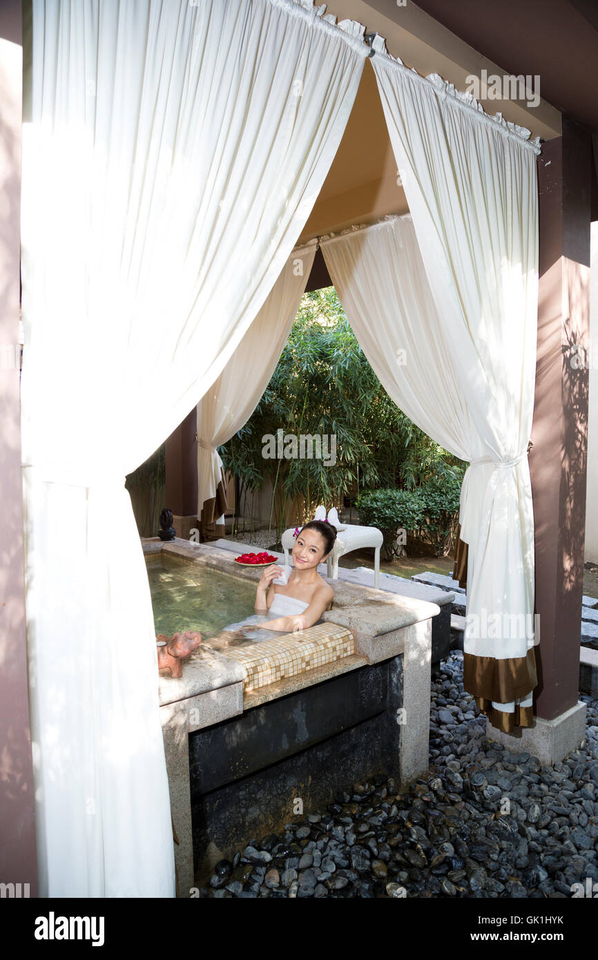 Young woman bathing Stock Photo - Alamy