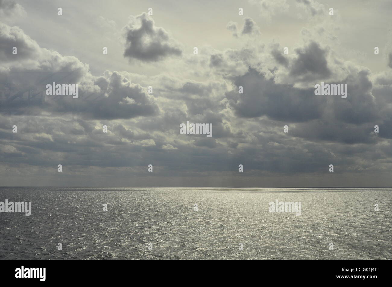 Rainfall in the Atlantic Ocean at a distance Stock Photo - Alamy