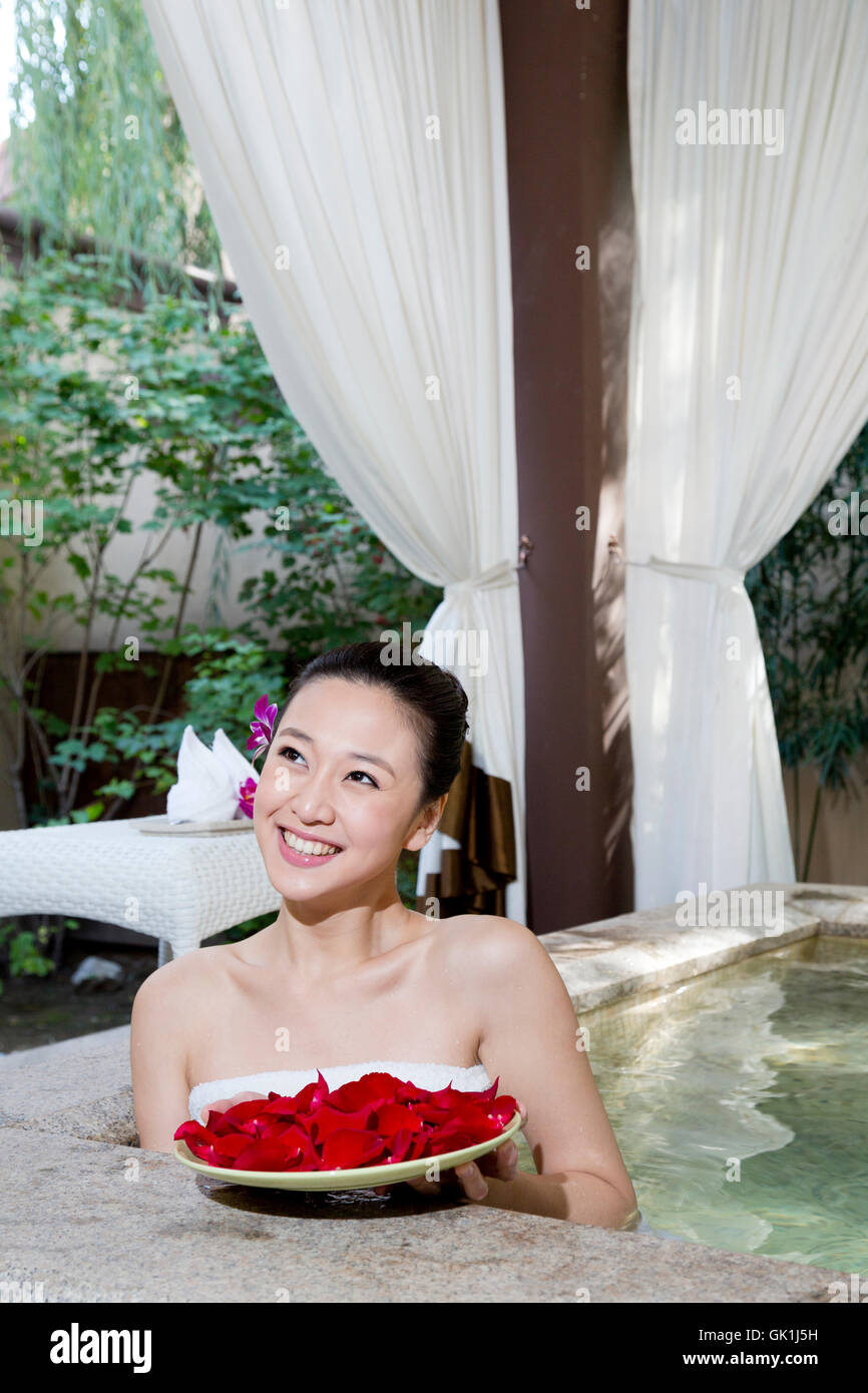 Young woman bathing Stock Photo - Alamy