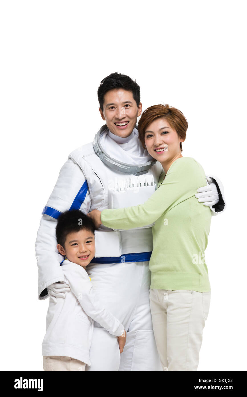 Studio shot a three astronauts Stock Photo - Alamy