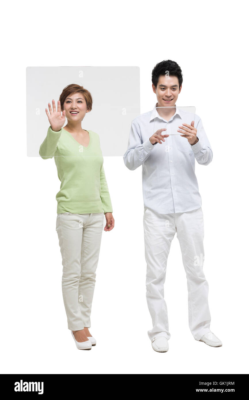 Studio shot couple of high-tech life Stock Photo - Alamy