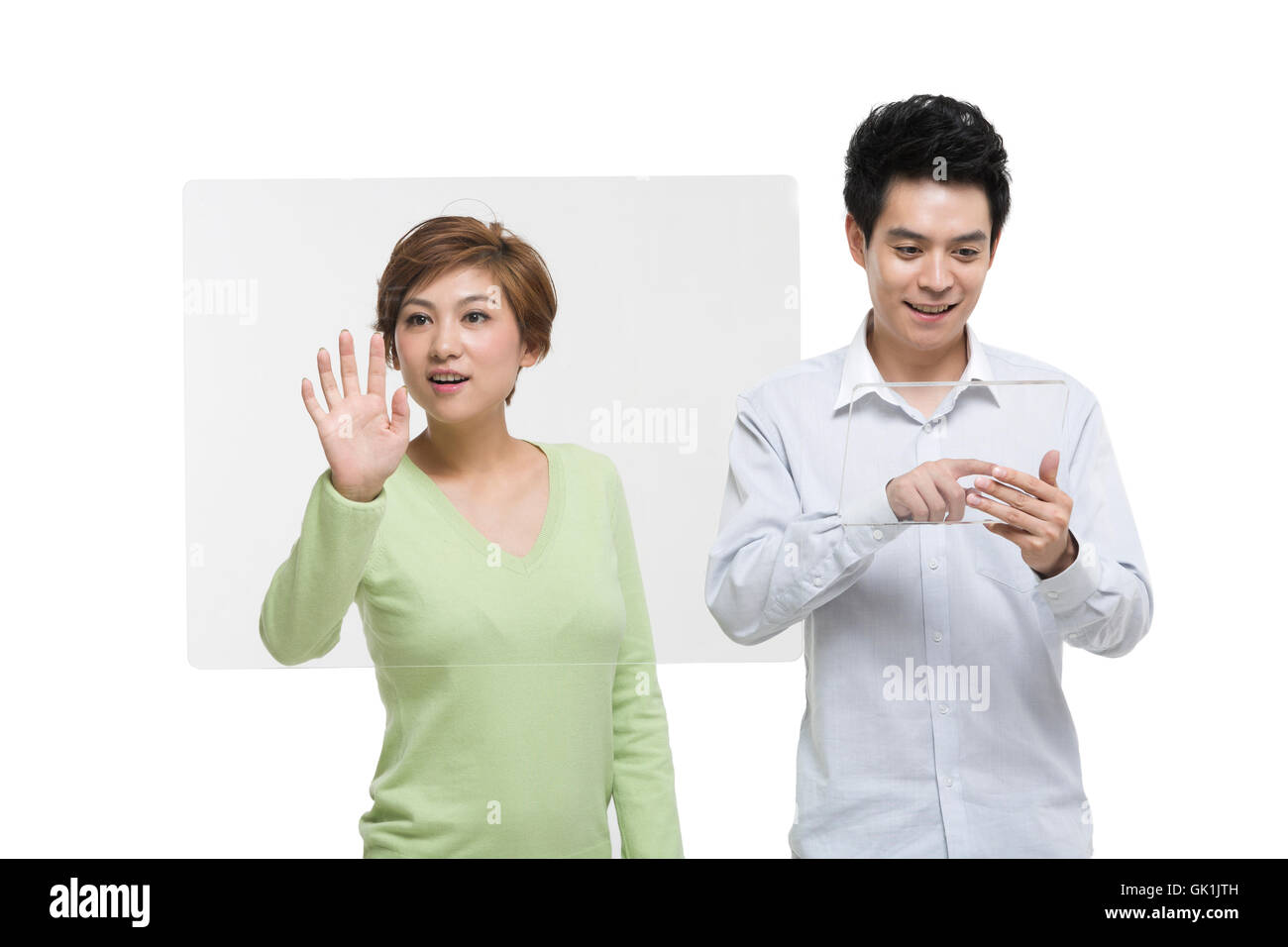 Studio shot couple of high-tech life Stock Photo - Alamy