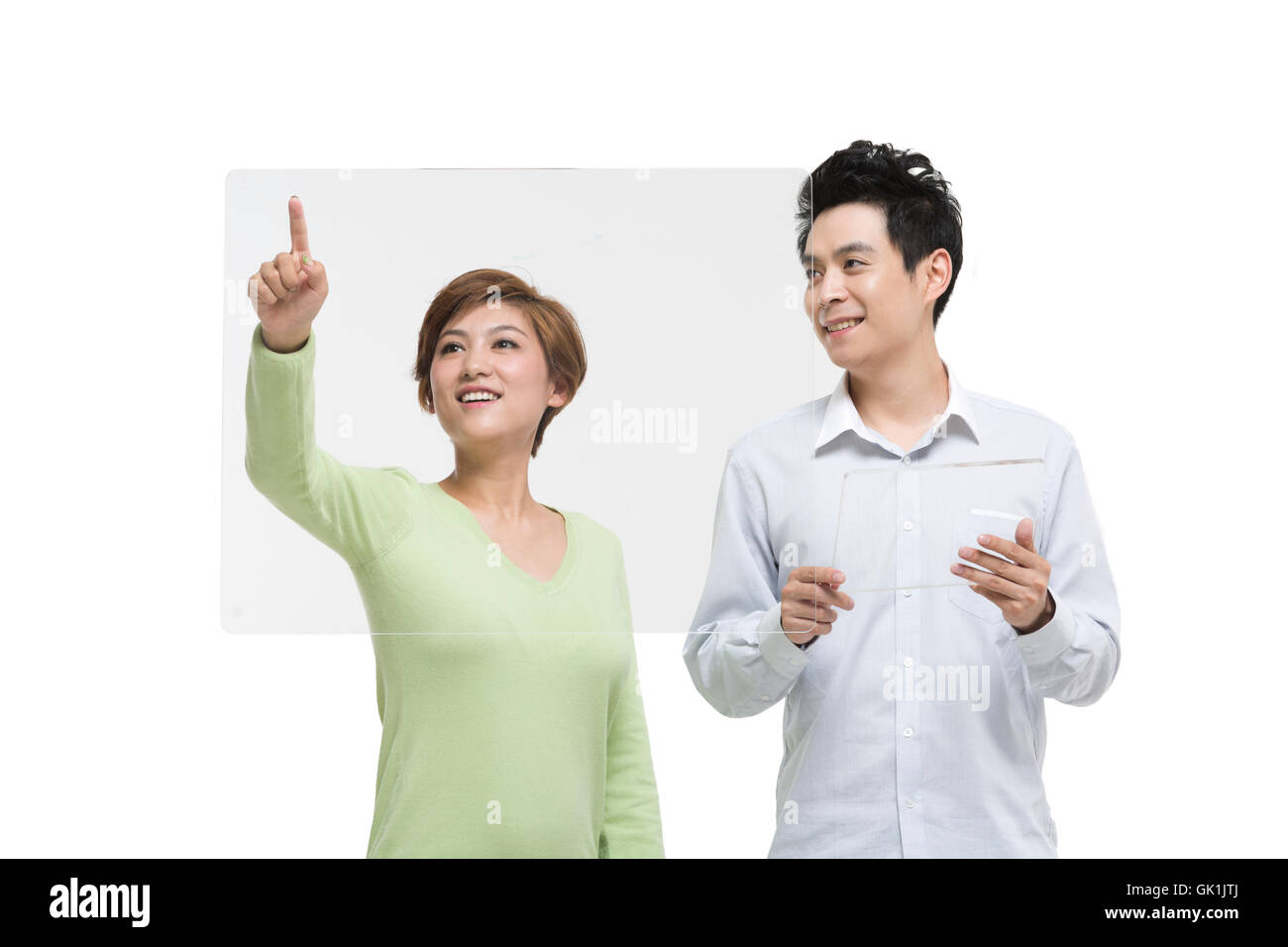 Studio shot couple of high-tech life Stock Photo - Alamy