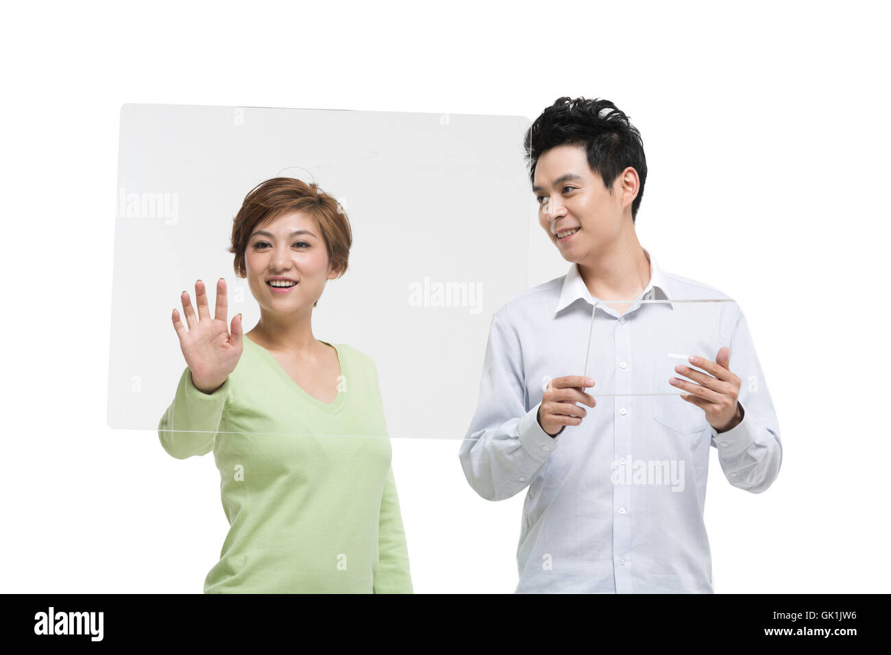 Studio shot couple of high-tech life Stock Photo - Alamy