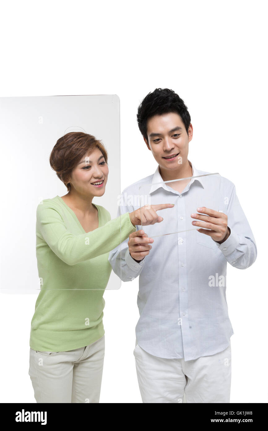 Studio shot couple of high-tech life Stock Photo - Alamy