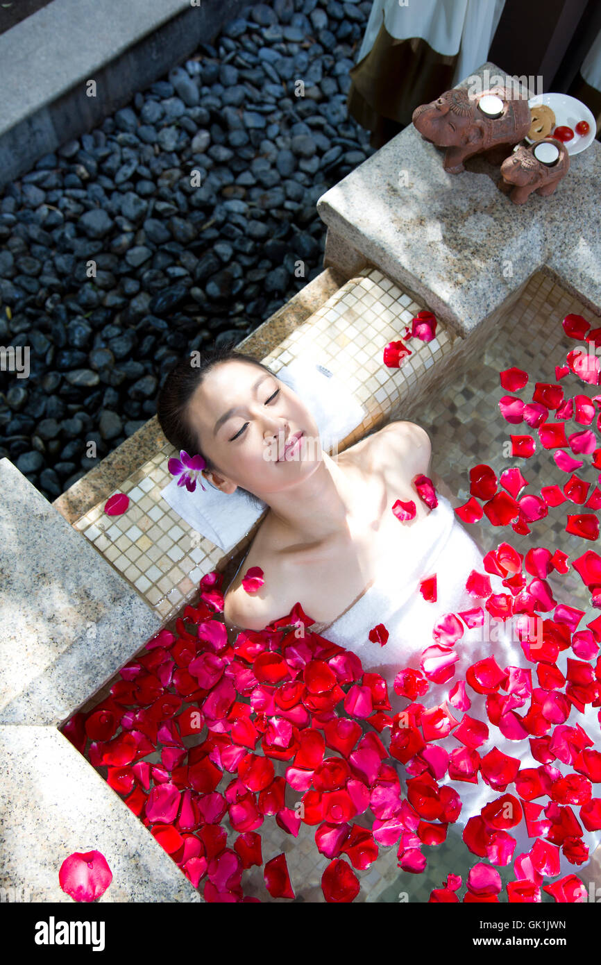 Young woman bathing Stock Photo - Alamy