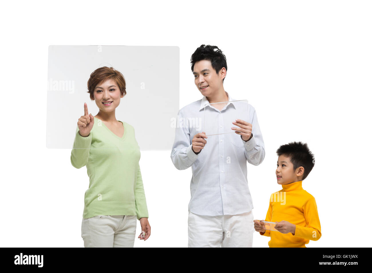 Studio shot of a family of three high-tech life Stock Photo - Alamy