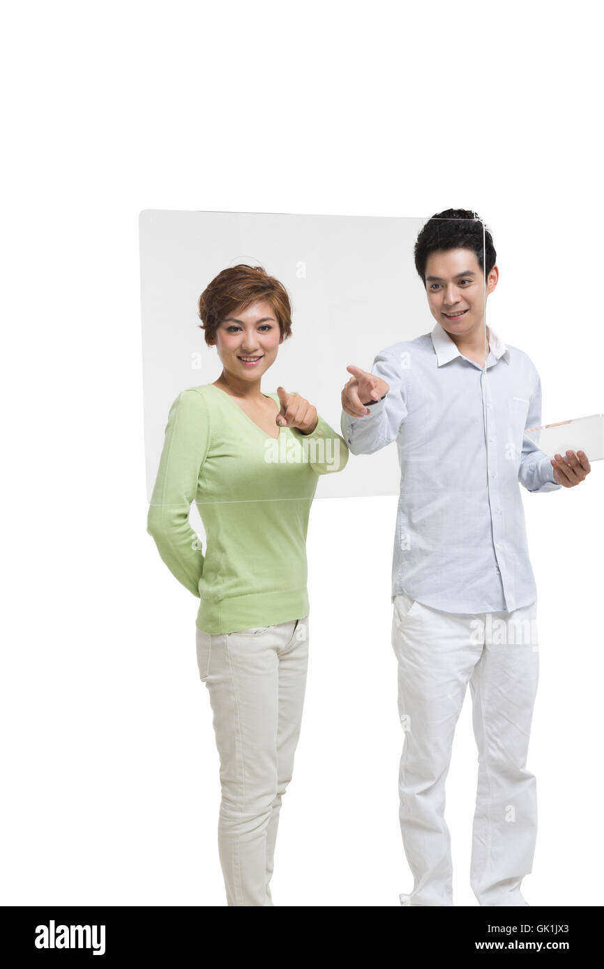 Studio shot couple of high-tech life Stock Photo - Alamy