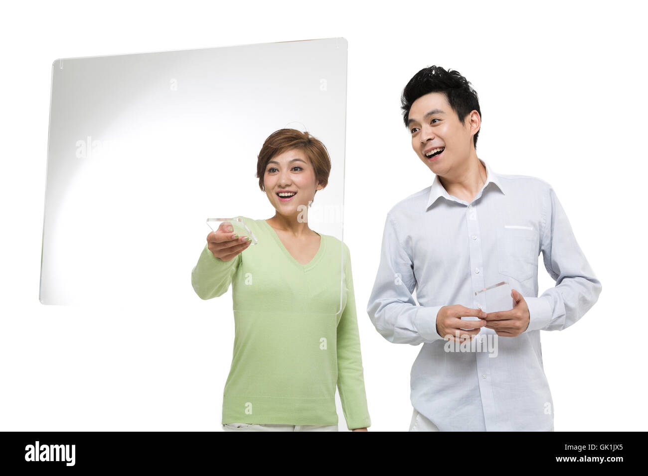 Studio shot couple of high-tech life Stock Photo - Alamy