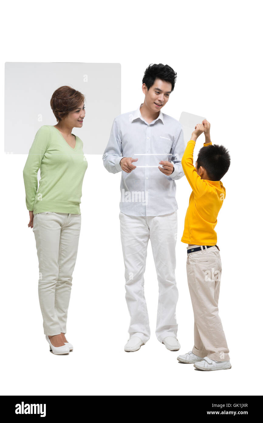 Studio shot of a family of three high-tech life Stock Photo - Alamy