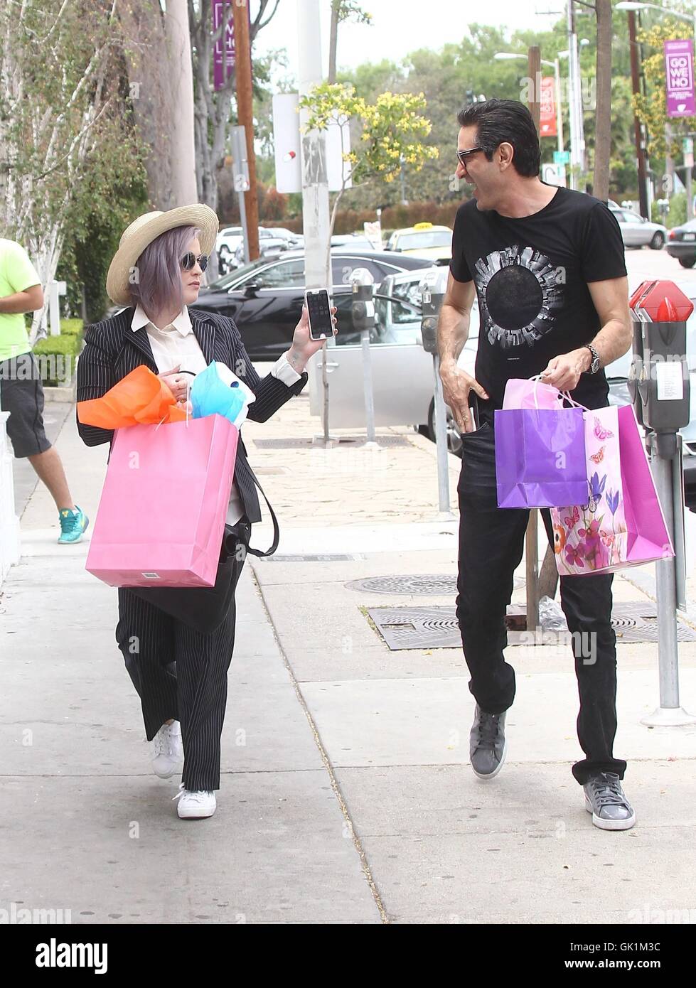 Kelly Osbourne and a friend arrive at Au Fudge in West Hollywood with ...