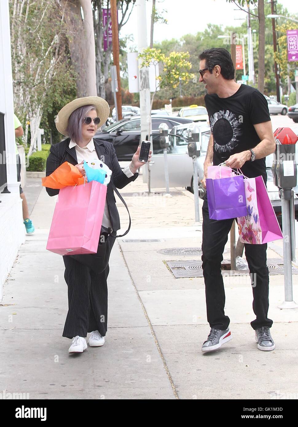 Kelly Osbourne and a friend arrive at Au Fudge in West Hollywood with ...