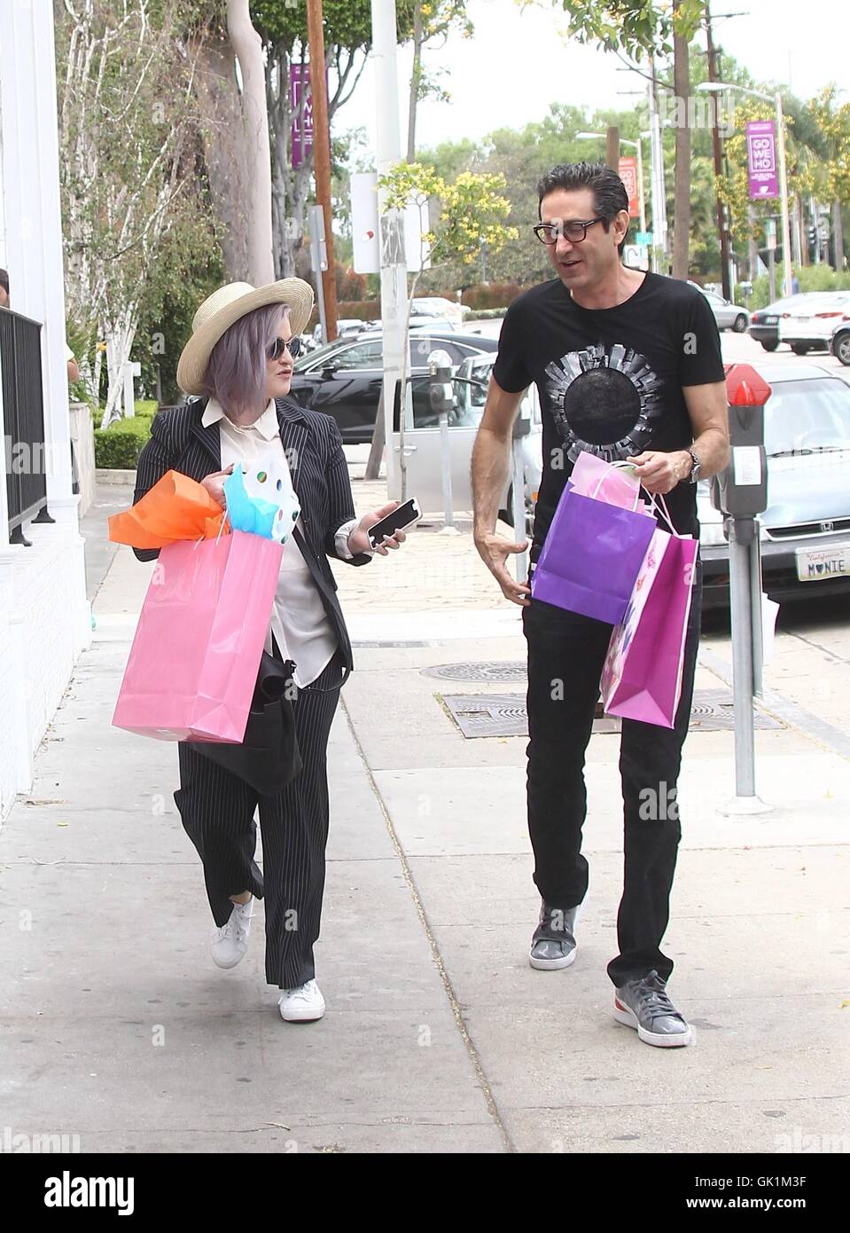 Kelly Osbourne and a friend arrive at Au Fudge in West Hollywood with ...