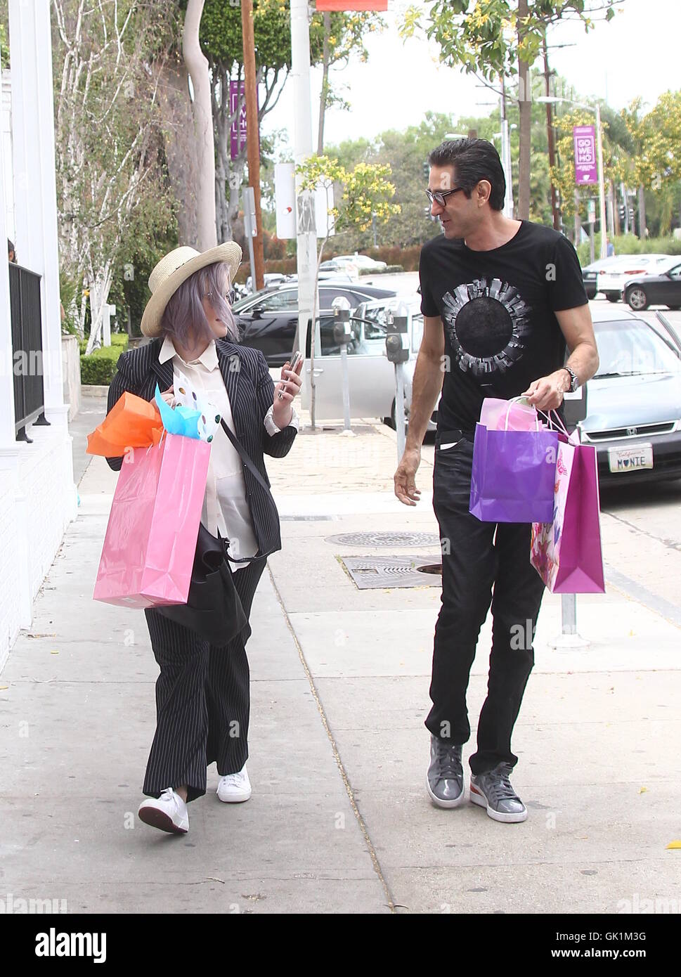 Kelly Osbourne and a friend arrive at Au Fudge in West Hollywood with ...