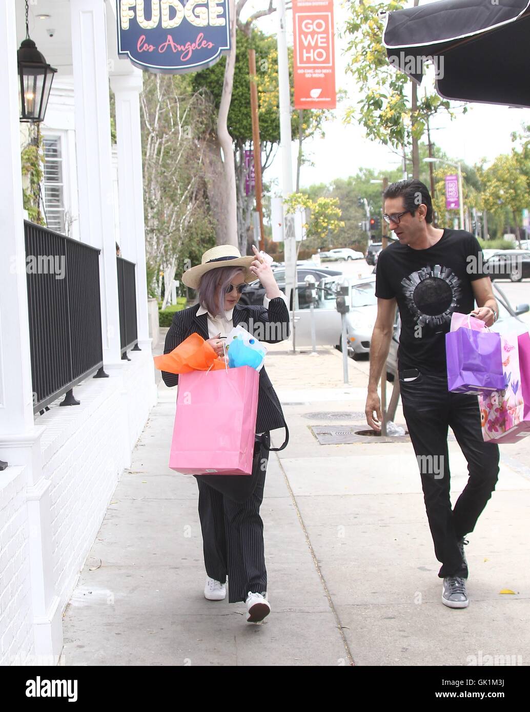 Kelly Osbourne and a friend arrive at Au Fudge in West Hollywood with ...