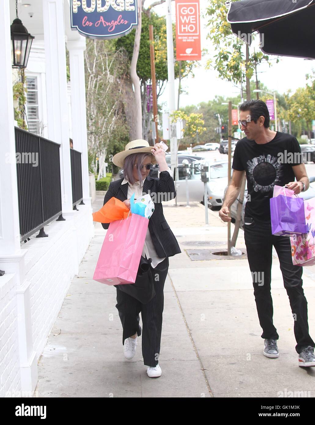Kelly Osbourne and a friend arrive at Au Fudge in West Hollywood with ...