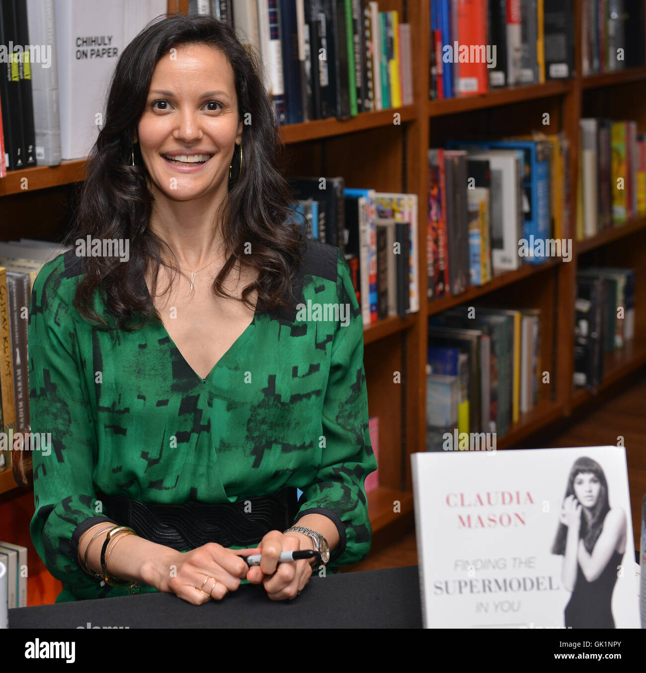 Claudia Mason signs copies of her book ' Finding the Supermodel in You ...