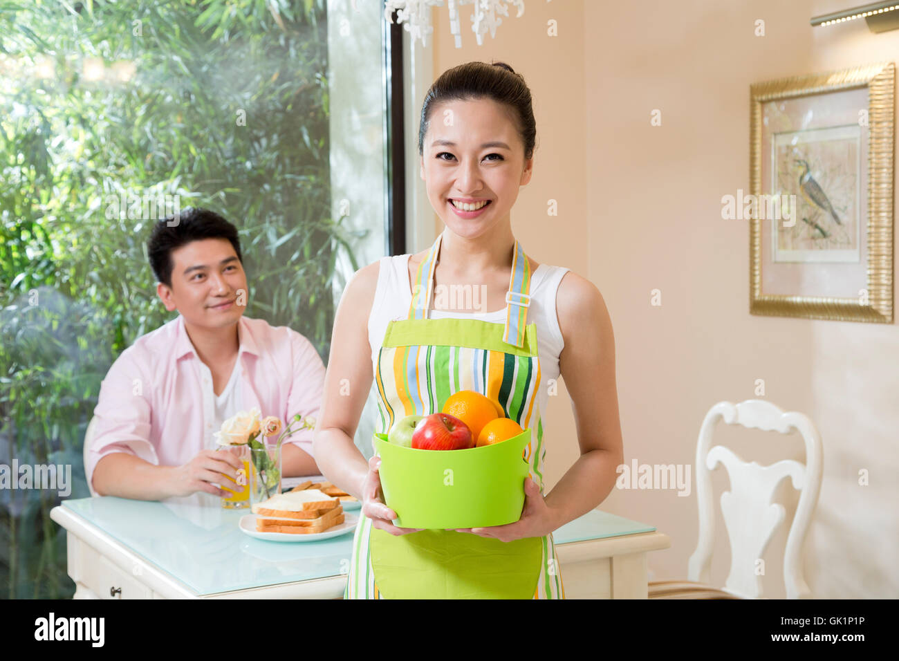 Couple doing housework Stock Photo - Alamy