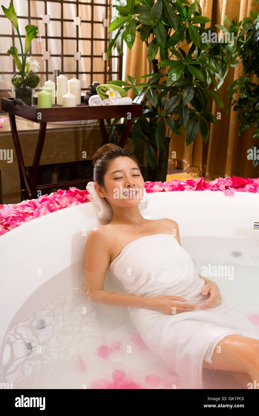 A young woman bathing Stock Photo - Alamy