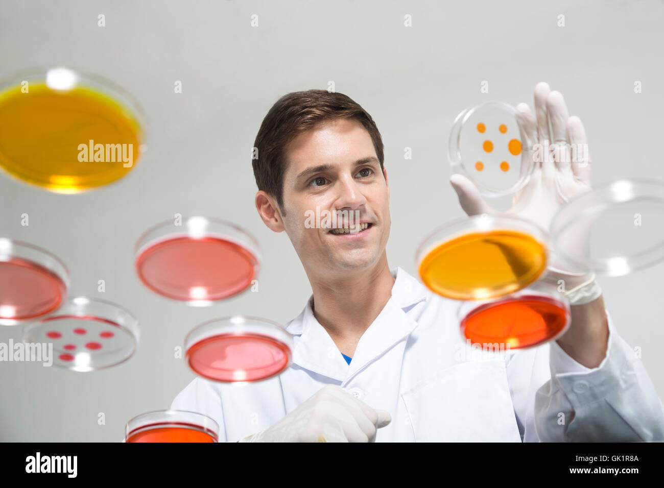 Scientists in the lab doing a science experiment Stock Photo - Alamy