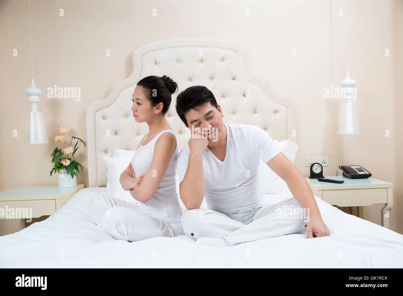 Couple in the bedroom intimacy Stock Photo - Alamy