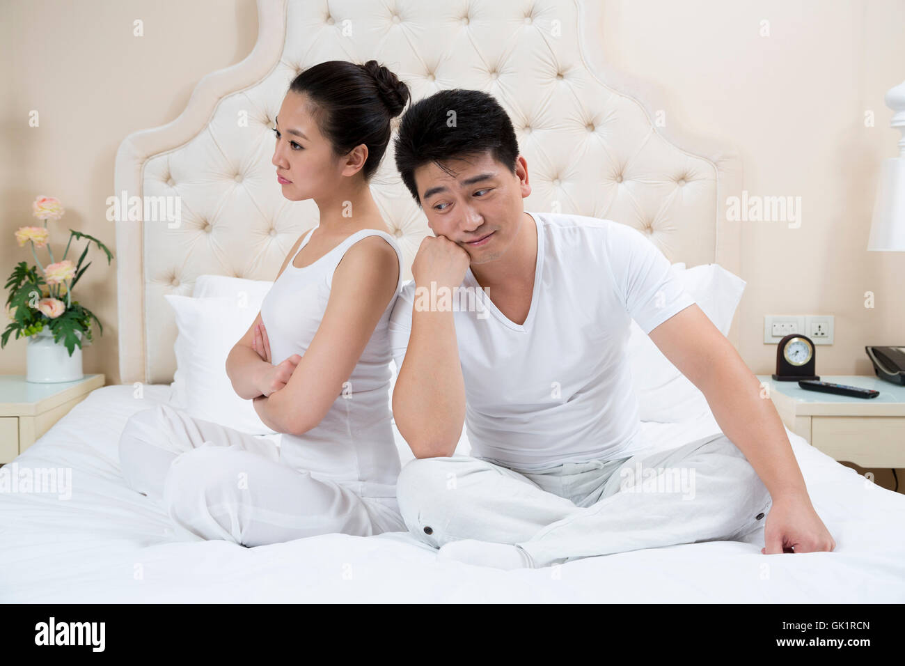 Couple in the bedroom intimacy Stock Photo - Alamy