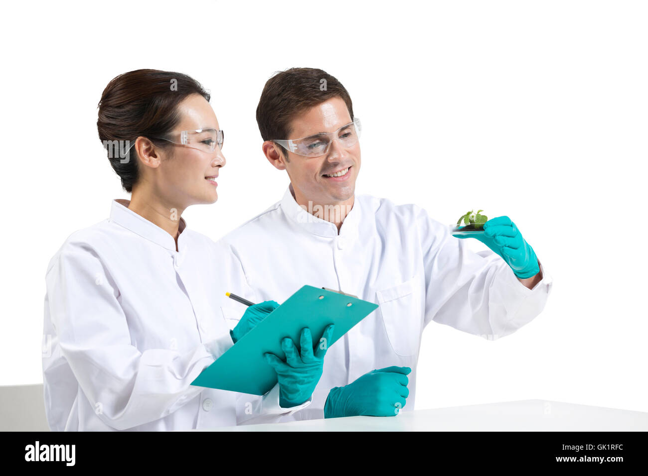 Scientists in the lab doing a science experiment Stock Photo - Alamy
