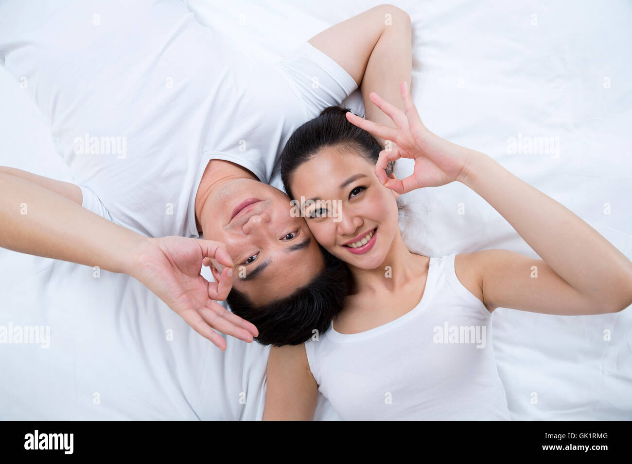 Couple in the bedroom intimacy Stock Photo - Alamy